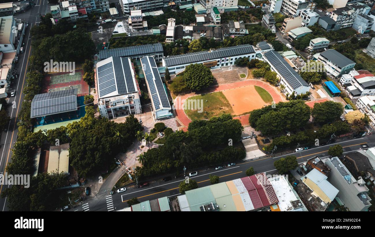 Solar panels on a high school roof hi-res stock photography and images ...