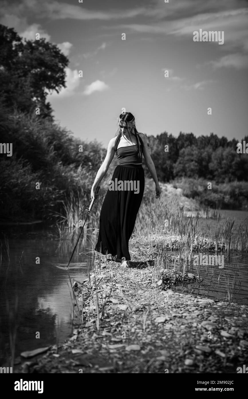 Caucasian woman standing near Black and White Stock Photos & Images - Alamy