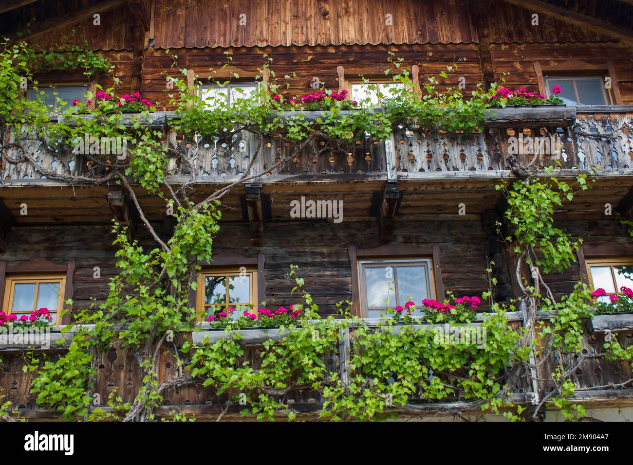 A traditional Austrian mountain farm house in the alpine village of ...