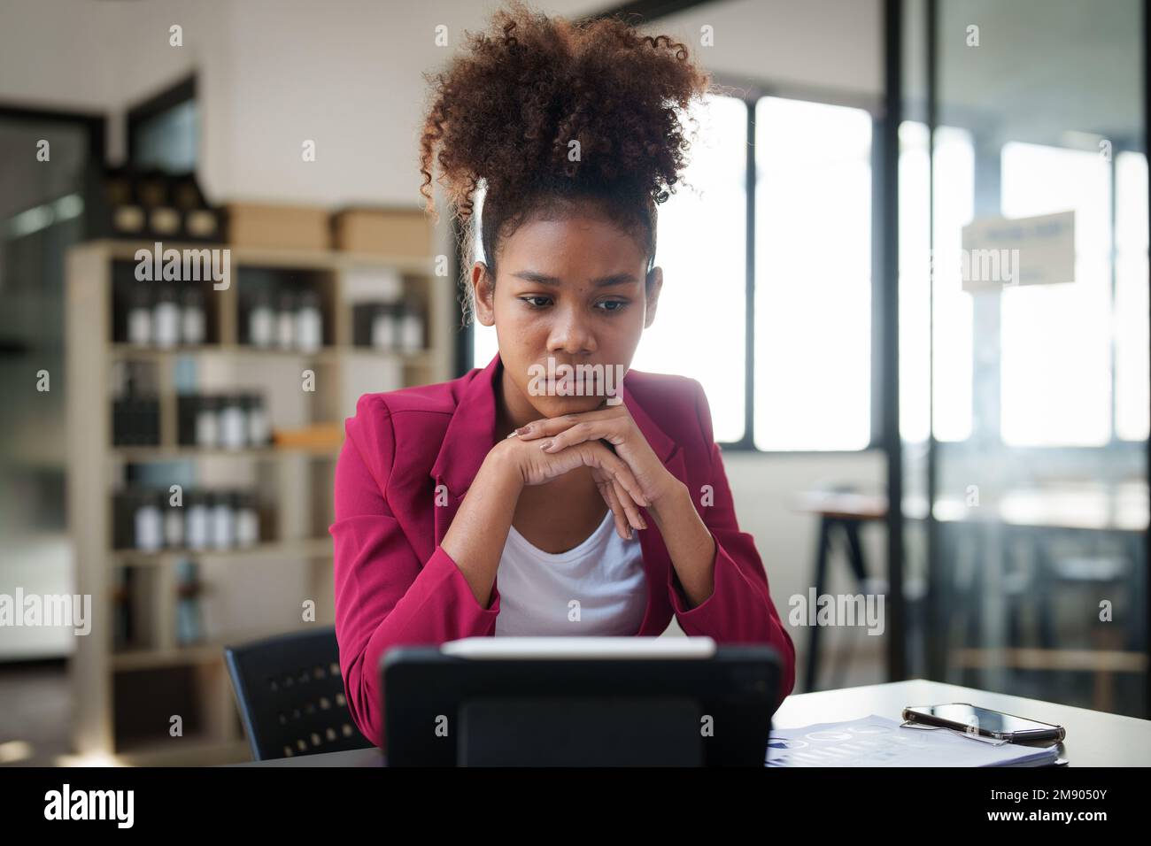Portrait thoughtful confused young african american businesswoman ...