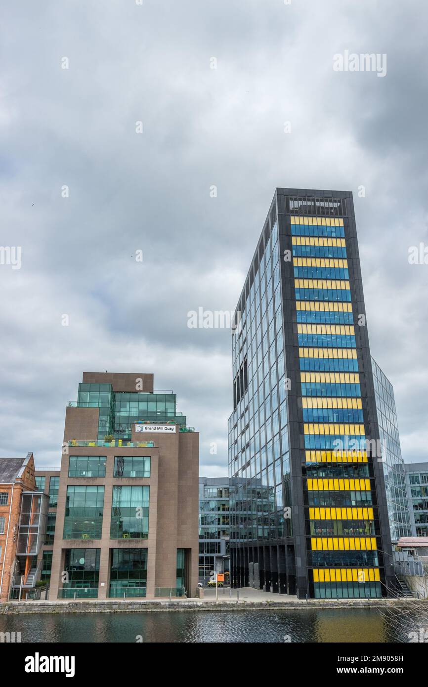 A vertical urban shot of the streets of Dublin with modern buildings ...