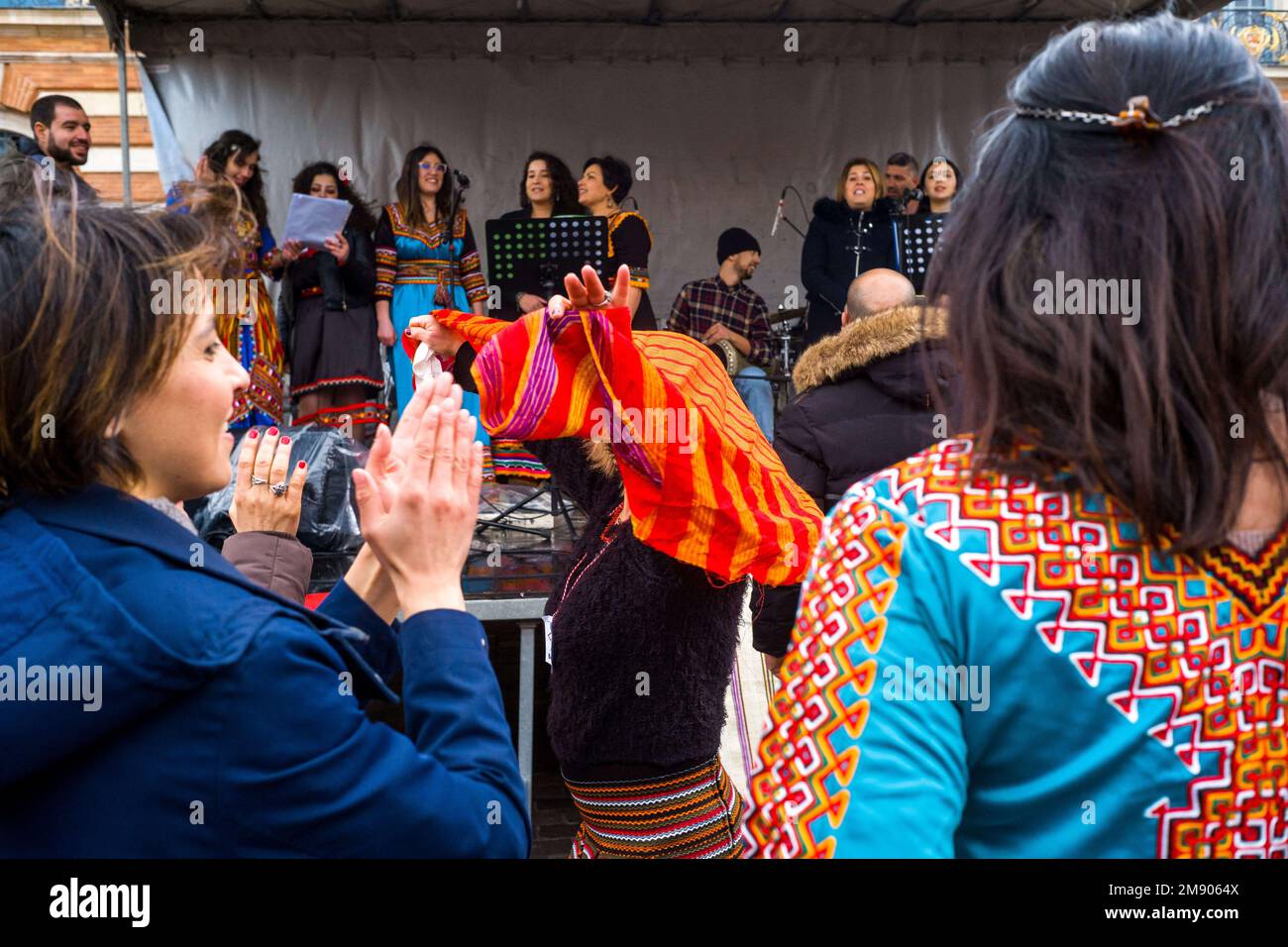 Singers from the association s choir on stage with women dancing in the ...