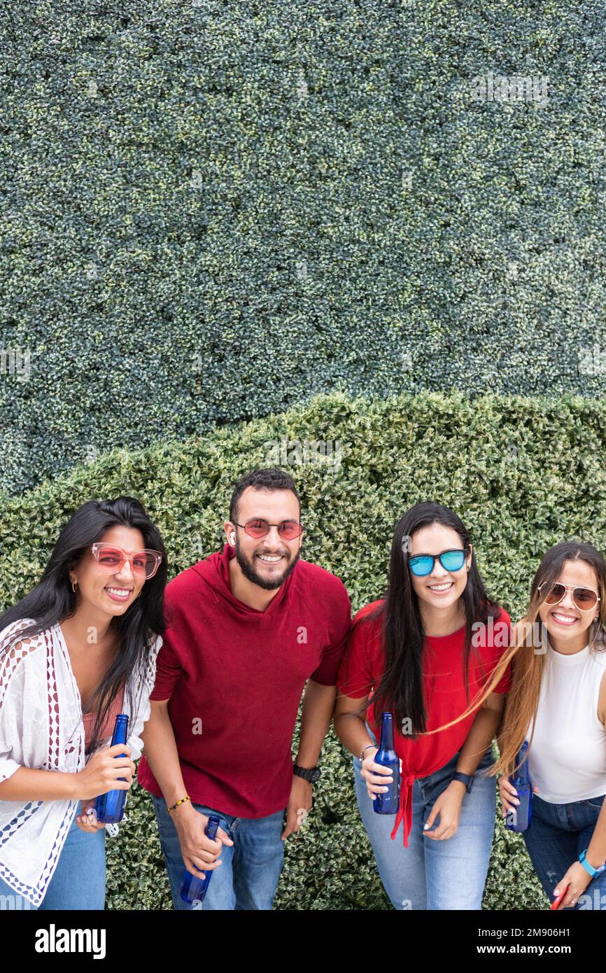 Portraits of Latino friends having fun in the outdoors Stock Photo - Alamy