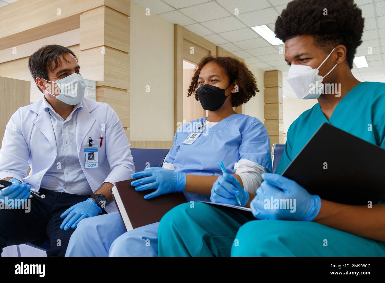 professor doctor give advice and discuss with intern student team for ...