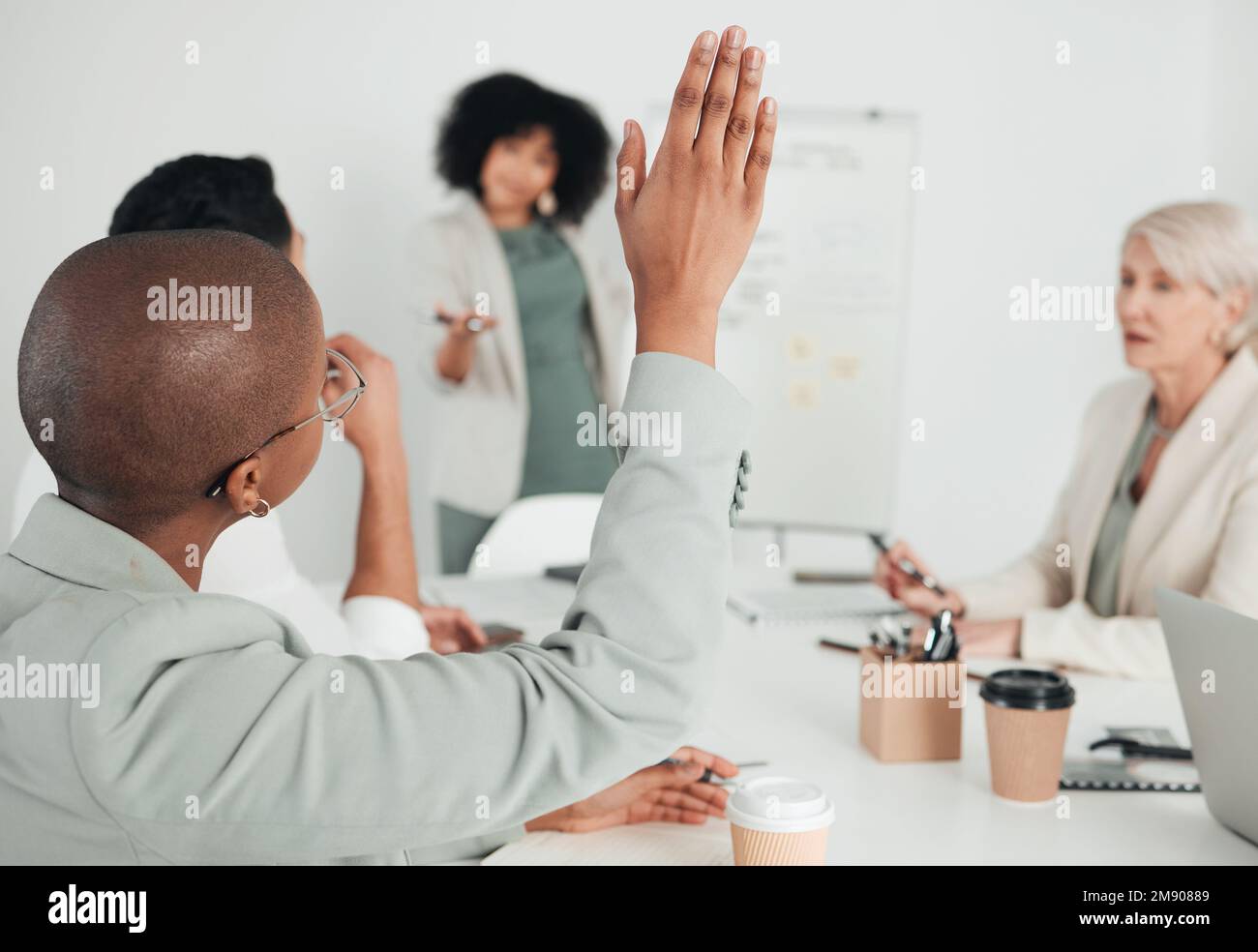 Raise your hand if youre in the world of business. a businesswoman ...