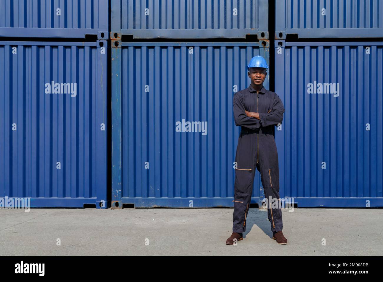 portrait of worker black african american man standing arm cross and ...