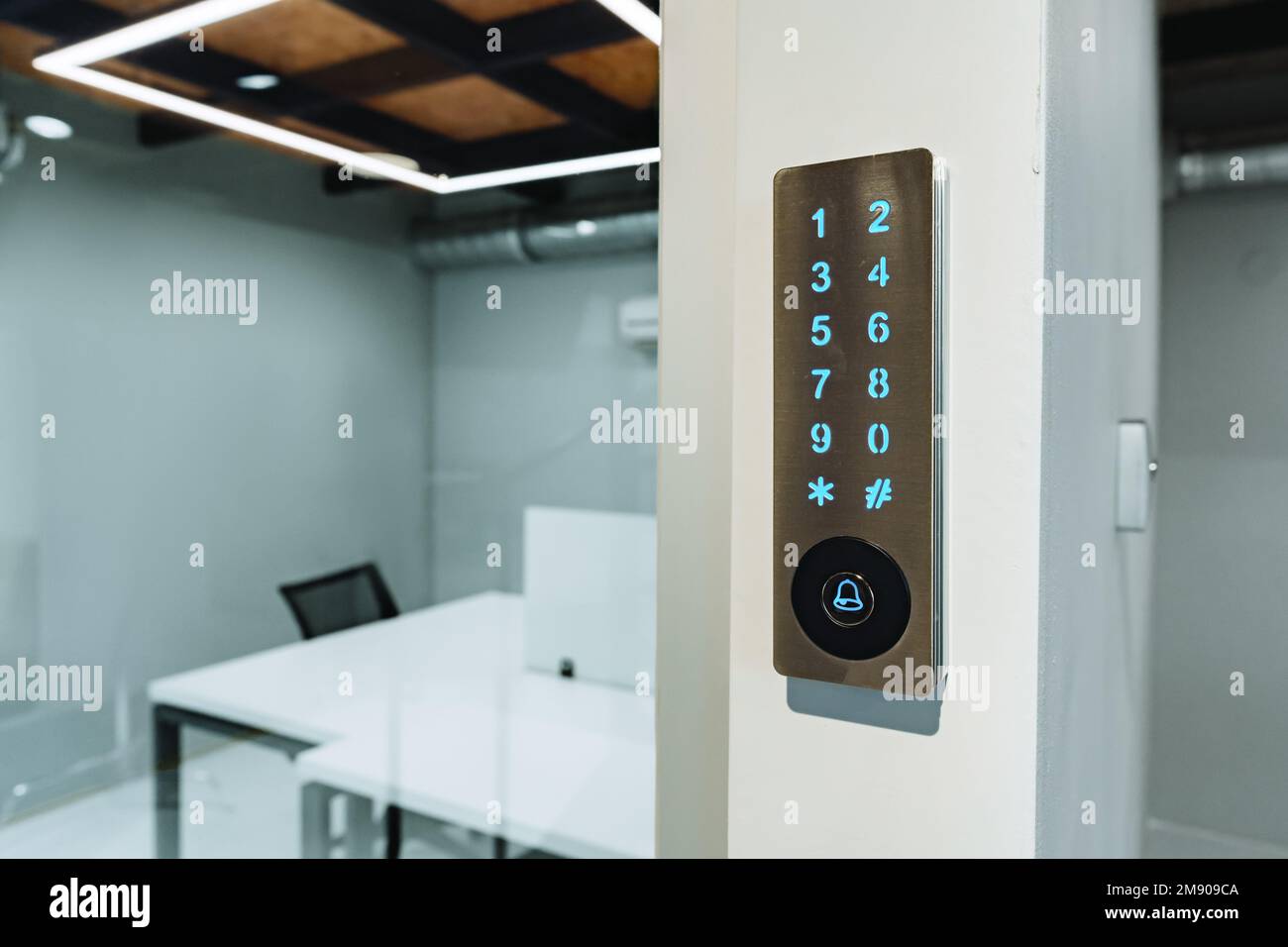 Electronic digital door lock on white office wall Stock Photo - Alamy