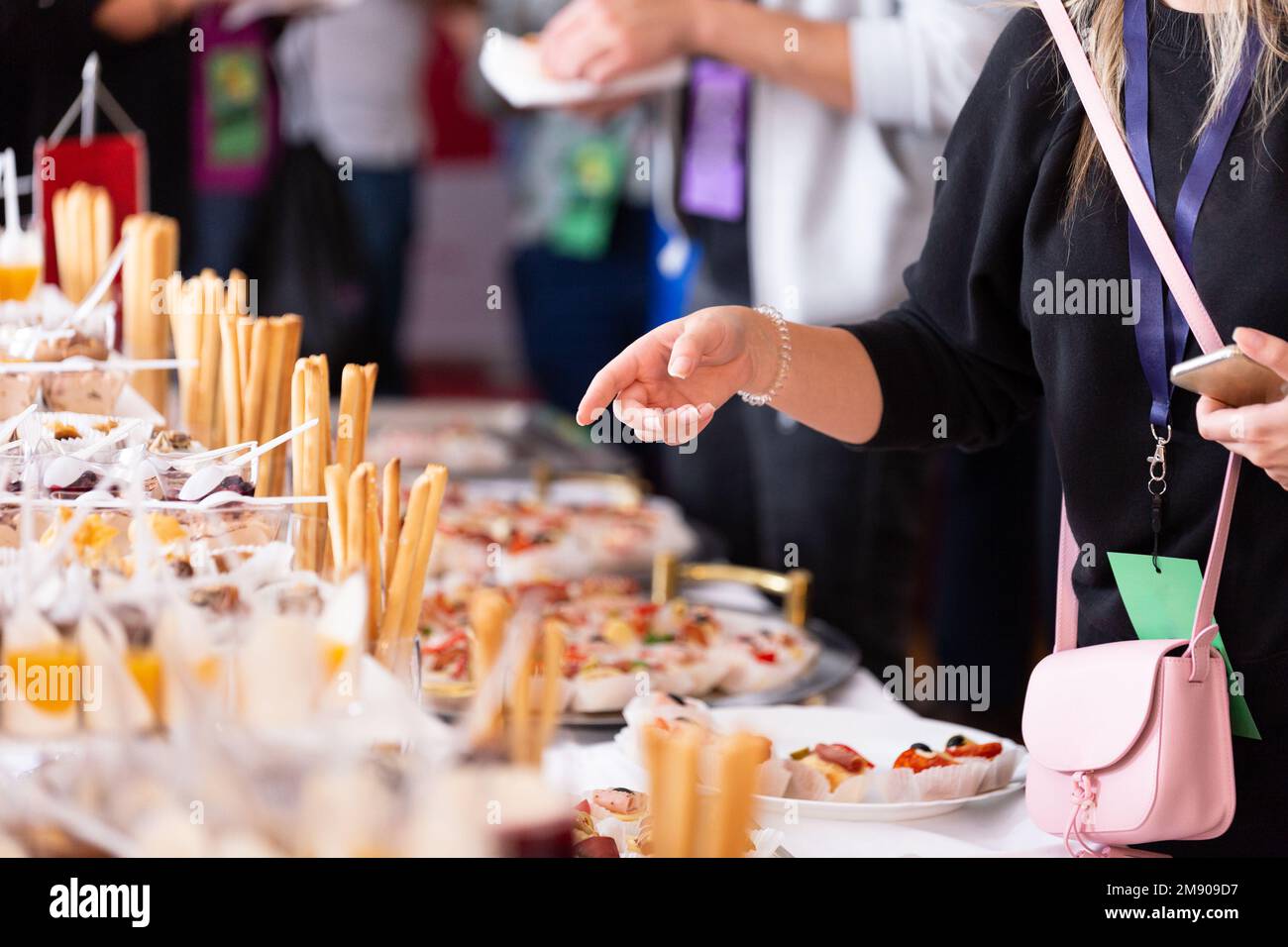 People serving themselves buffet hi-res stock photography and images ...