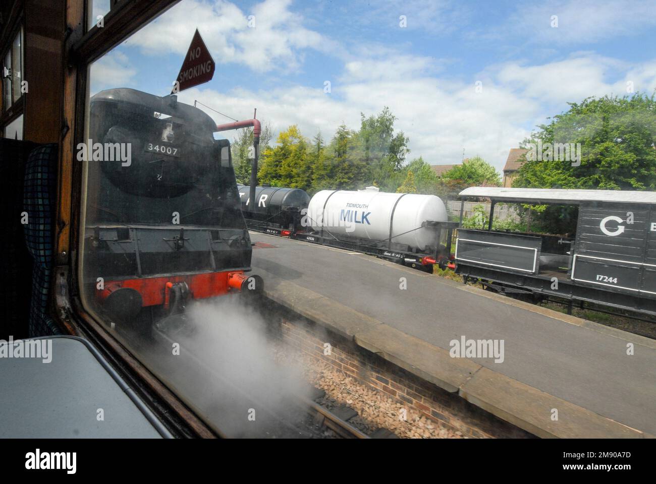 From a window of a vintage passenger steam train carriage showing the ...