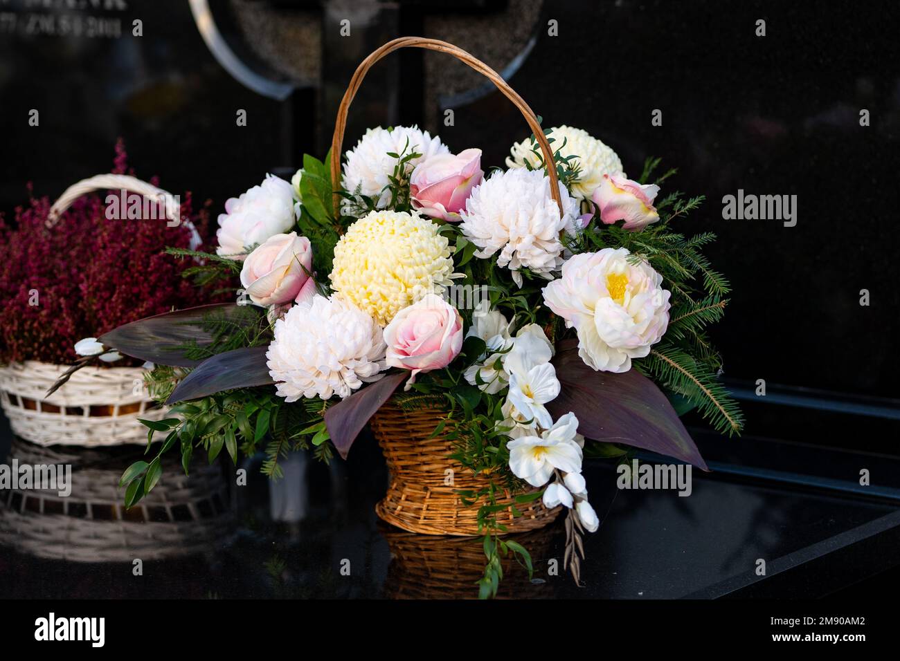 The flowers and candles at the grave, Grief and paying respect for a dead person Stock Photo - Alamy