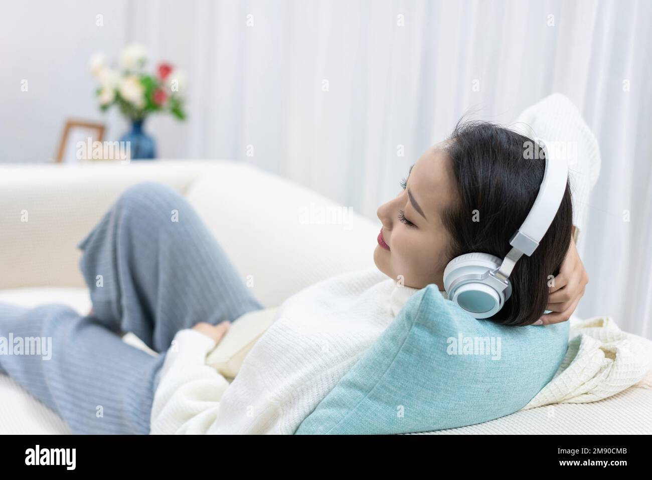 The young woman at home to enjoy leisure time Stock Photo - Alamy
