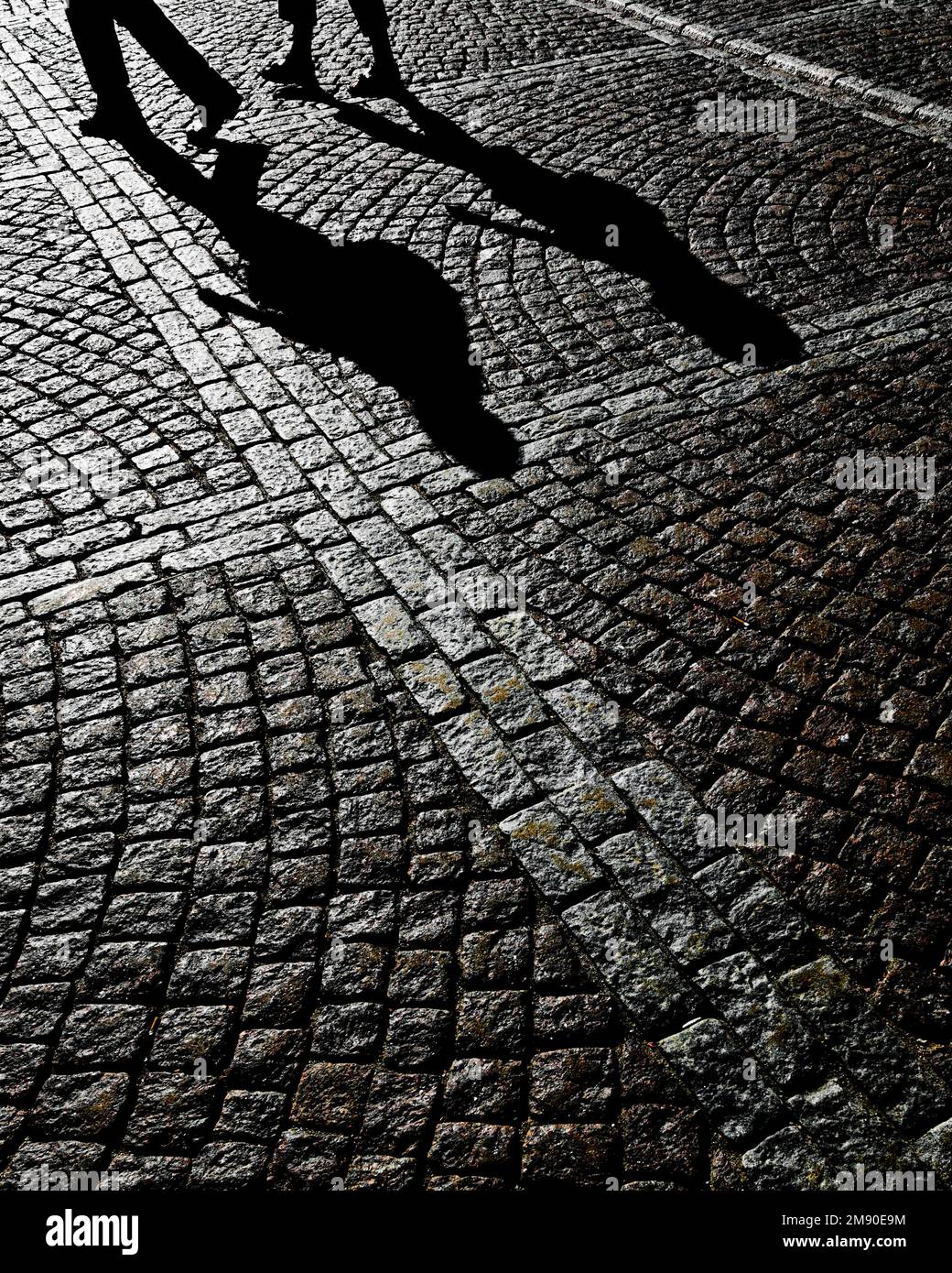 Black Shadows on the pavement Stock Photo - Alamy