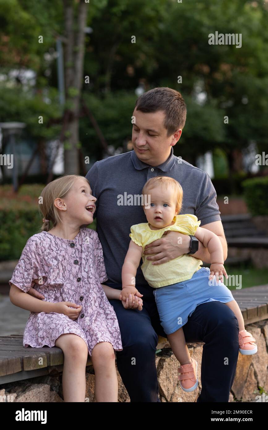 Happy father's day. Dad and his child daughter are playing and having ...