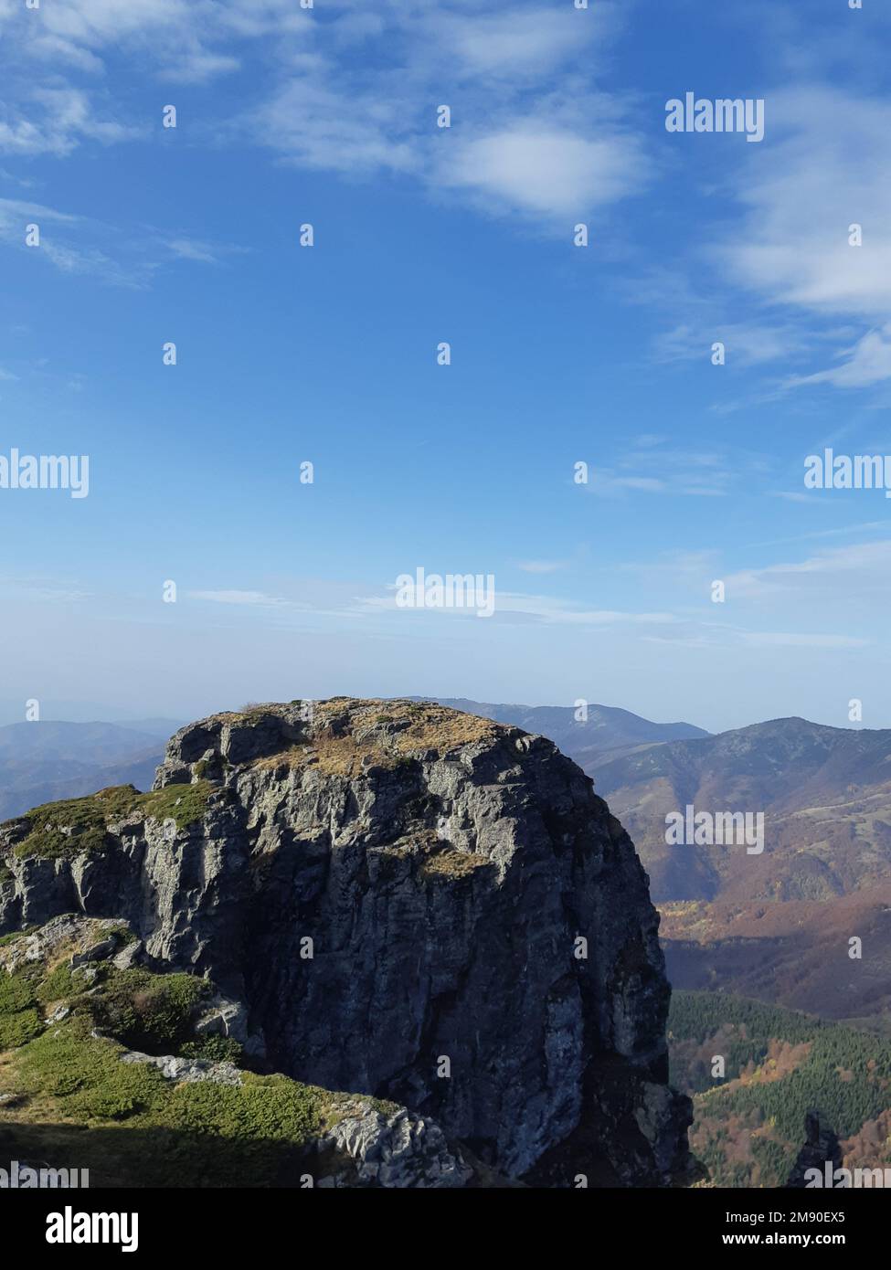 A high-angle of landscape view with mountains against clear sky ...
