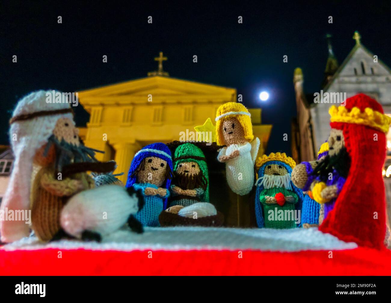 Knitted nativity scene beneath a December full moon and St Frances ...