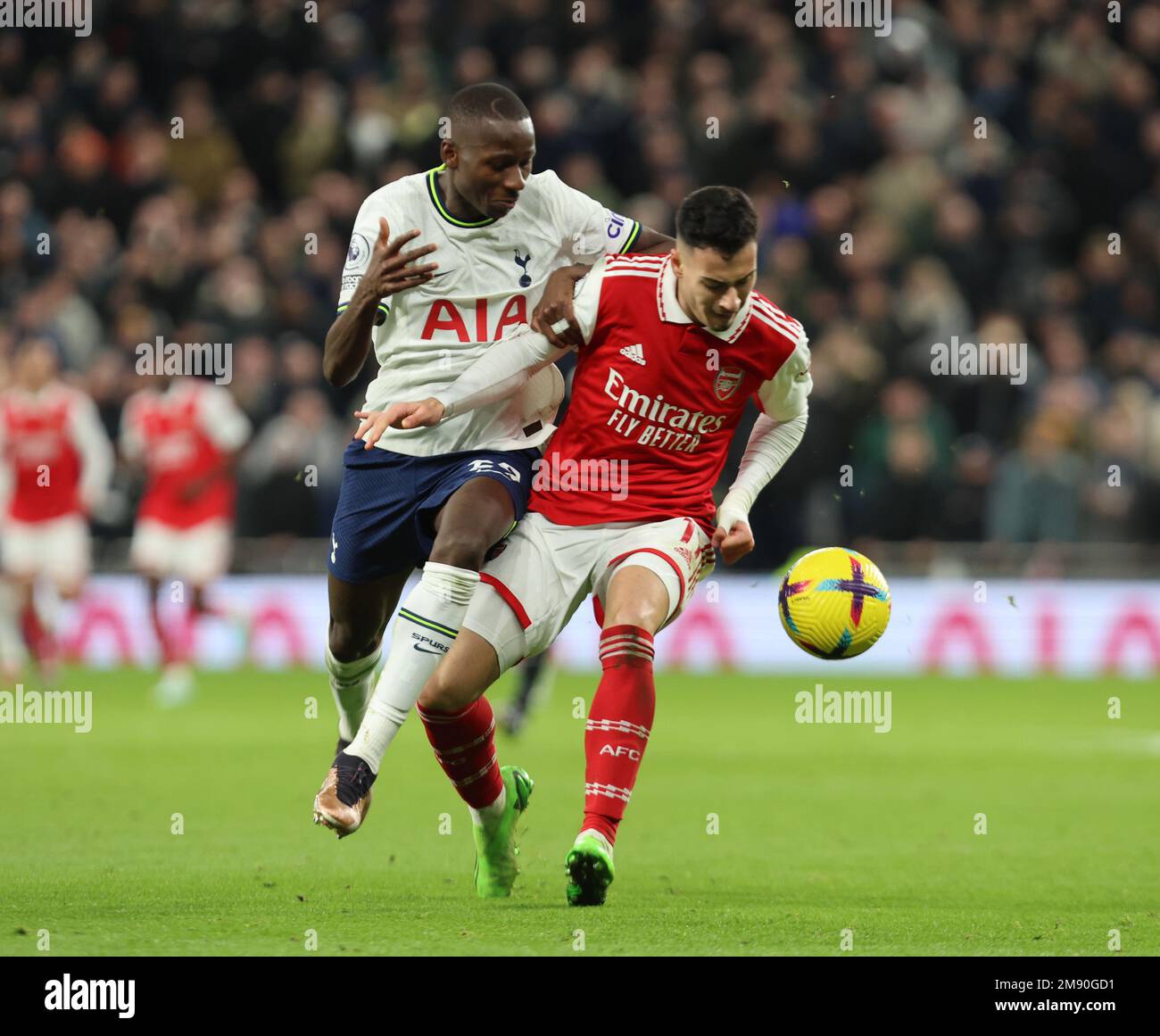 L-R Tottenham Hotspur's Pape Matar Sarr and Gabriel Martinelli of ...
