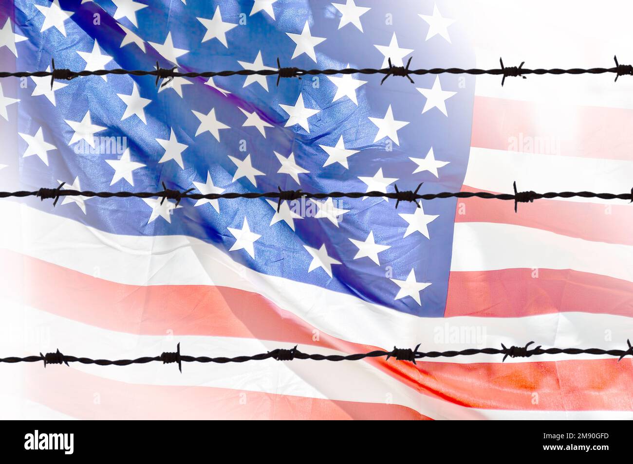 Metal fence with barbed wire on a USA flag. Separation concept, borders ...