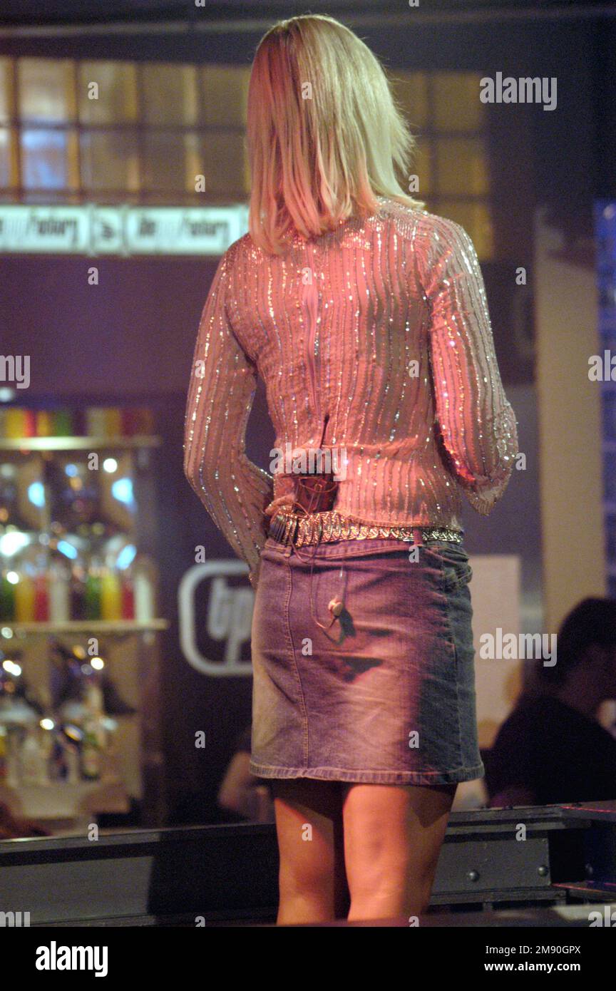 LIZ FULLER, WELSH MODEL, TV STAR, 2002: Liz Fuller waits side stage at ...