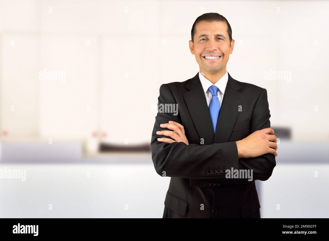 Portrait of a young confident man office worker dressed in luxury ...