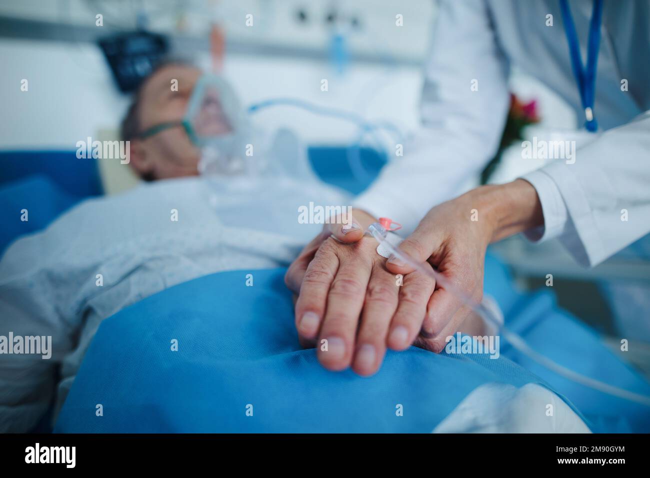 Close-up of nurse applying cannula at patients hand Stock Photo - Alamy