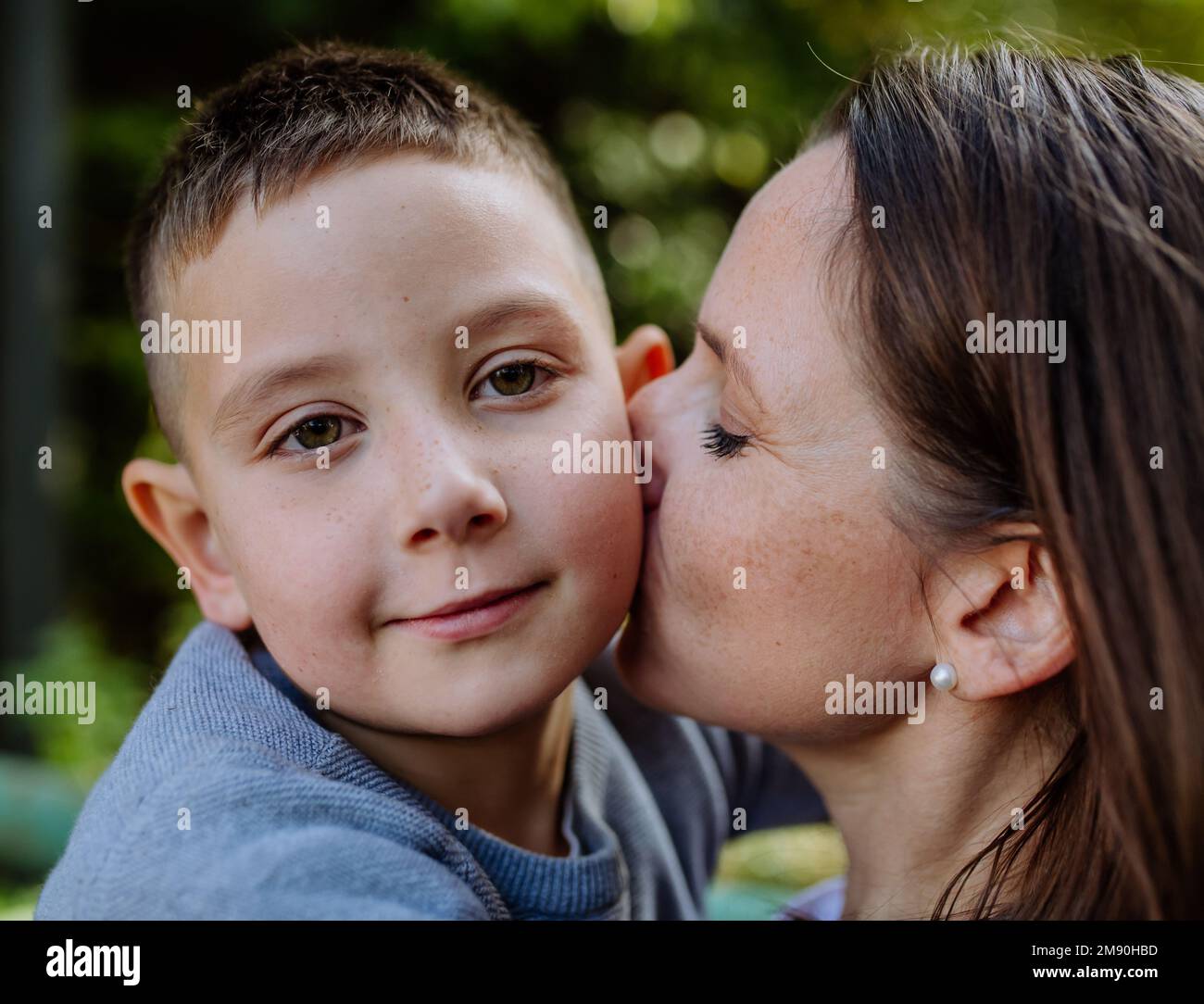 Portrait of mother with her son in forest Stock Photo - Alamy