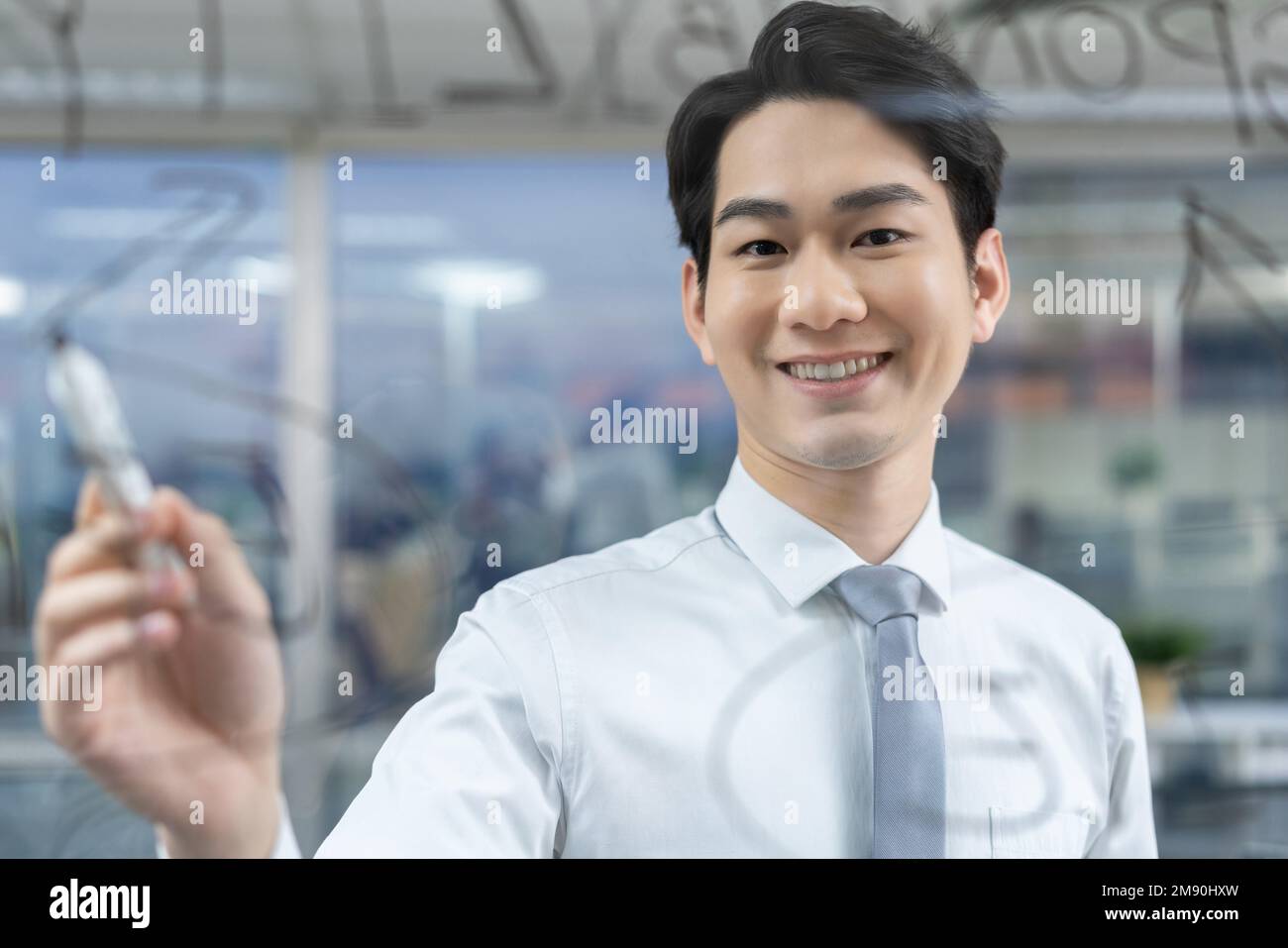 A young business man work in the office Stock Photo - Alamy