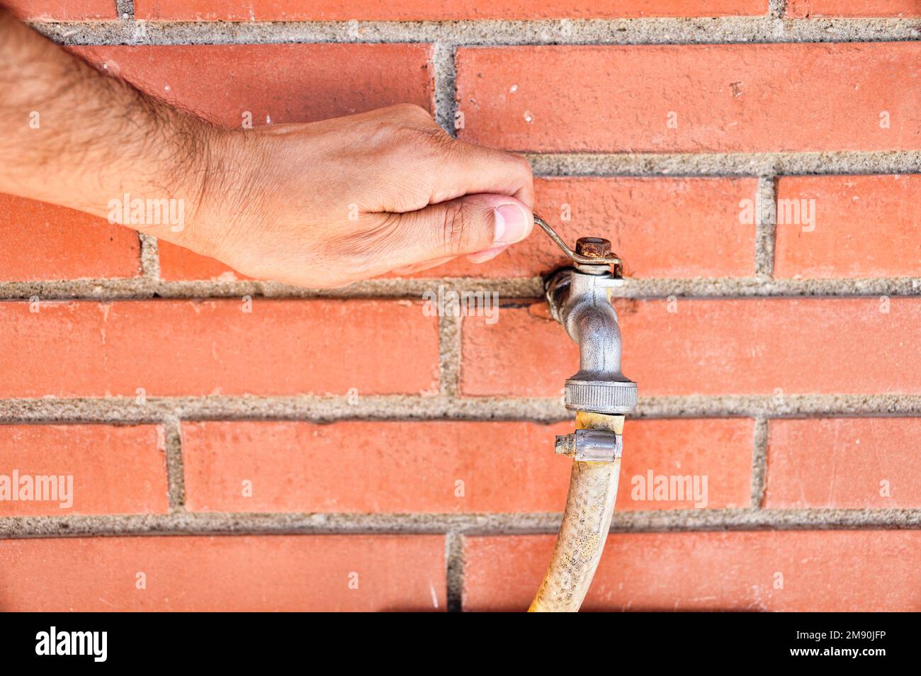 Hand opening valve hi-res stock photography and images - Alamy