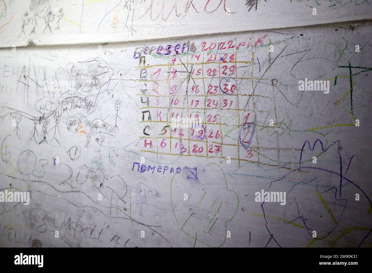 YAHIDNE, UKRAINE - JANUARY 14, 2023 - A calendar of March 2022 is seen on the wall in the school ...