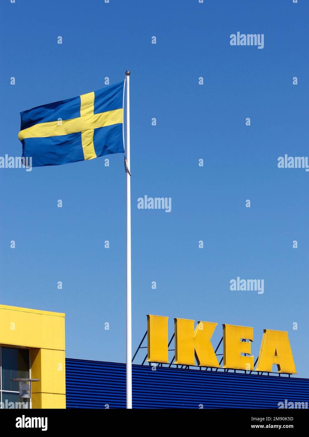 A swedish flag and an Ikea logo Stock Photo - Alamy