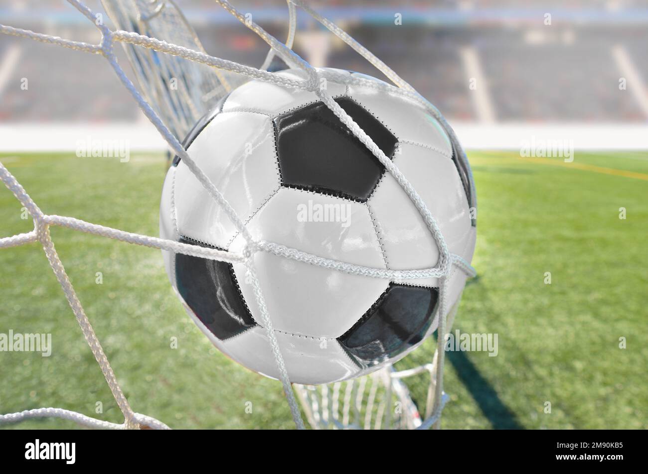 Soccer ball in the stadium hi-res stock photography and images - Alamy