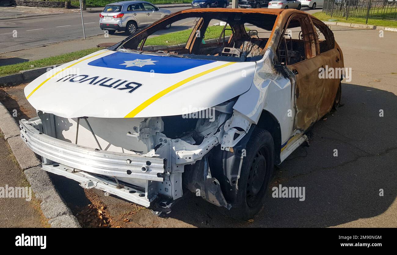 Burnt out police car. Vandalism, burned car. Car after the fire. Auto ...