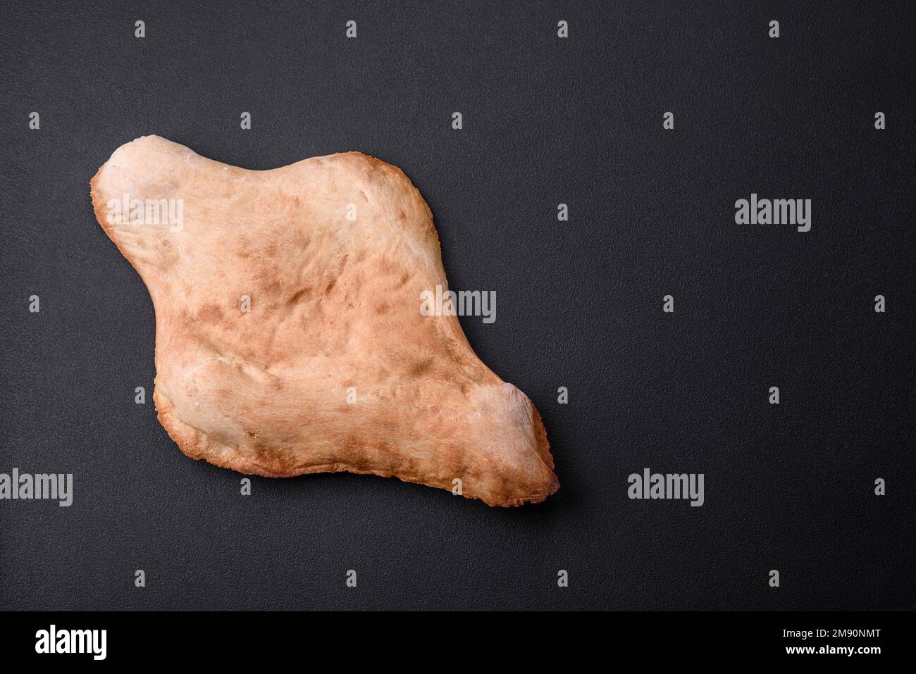 Delicious fresh crispy Georgian bread lavash baked in the oven on a ...