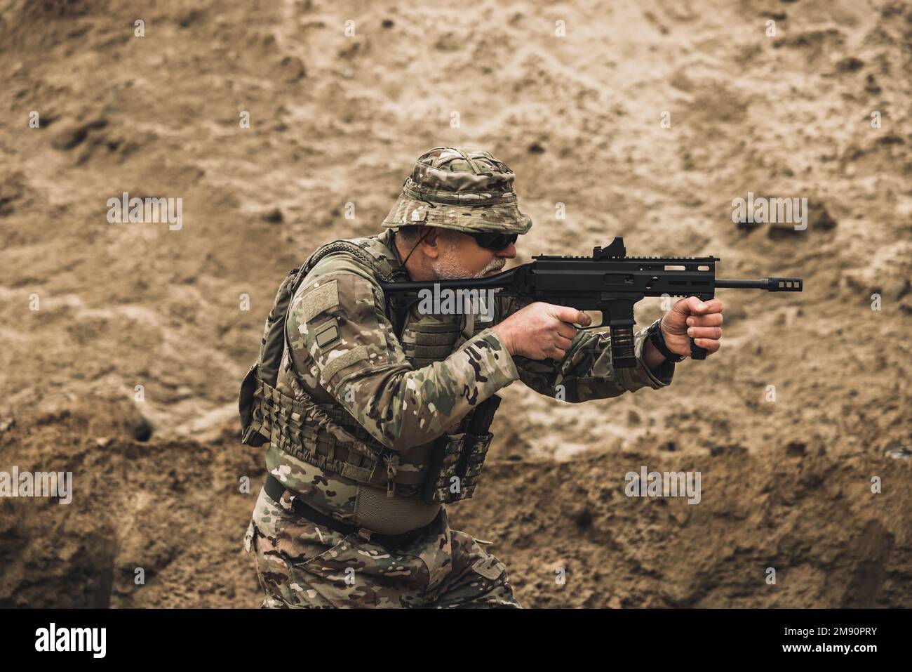 Soldier with a rifle on a shooting range Stock Photo - Alamy