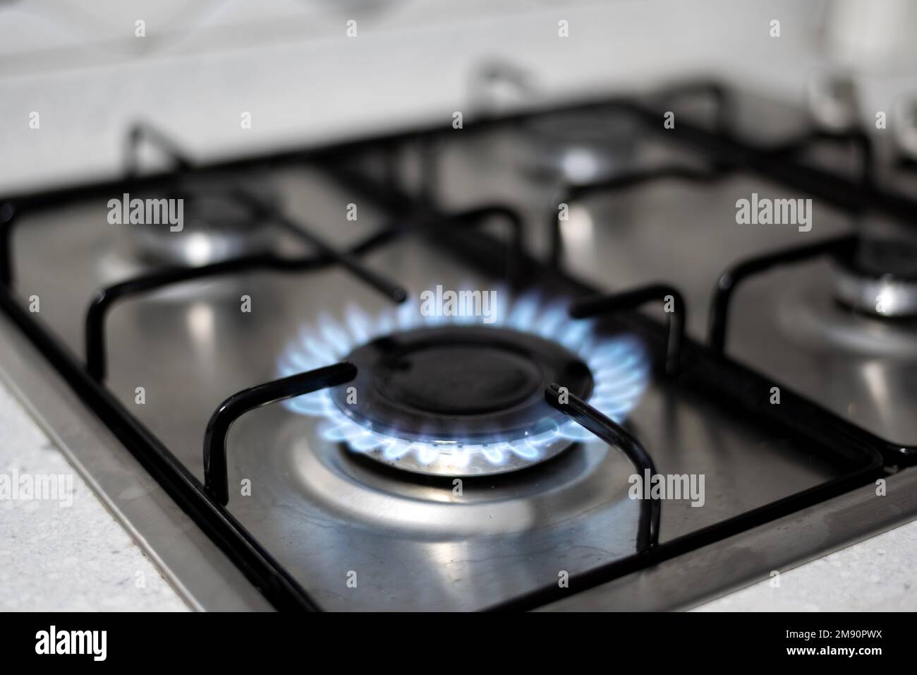 Gas flame, burning gas stove burner on the kitchen table Stock Photo ...