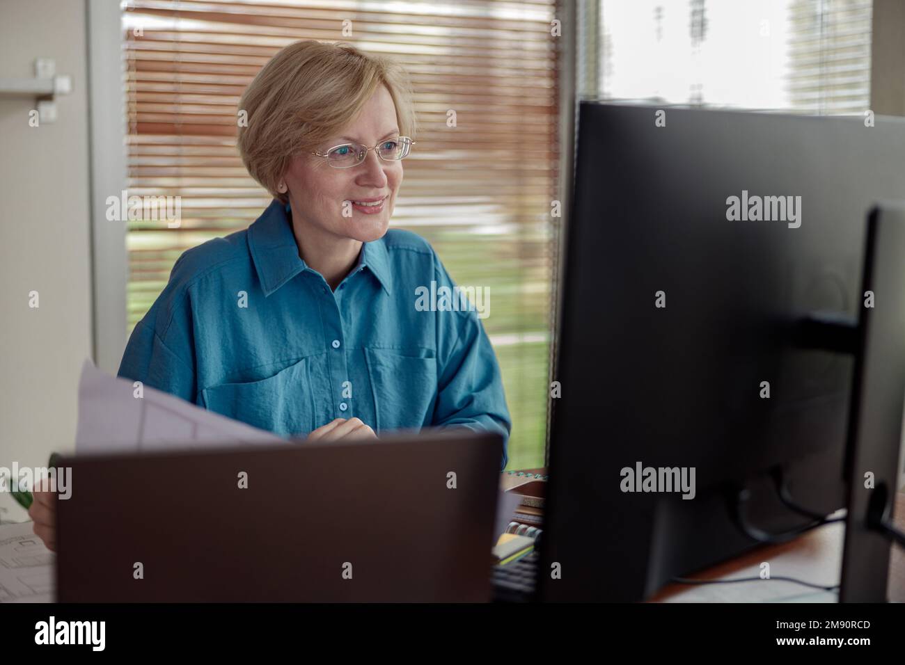 Engineer works computer drawing table hi-res stock photography and ...