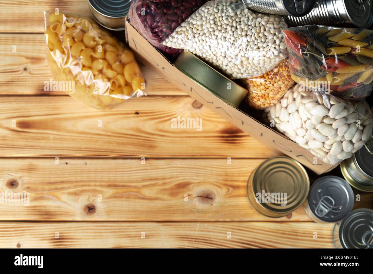 Food donations on the table. Text Donation Stock Photo - Alamy