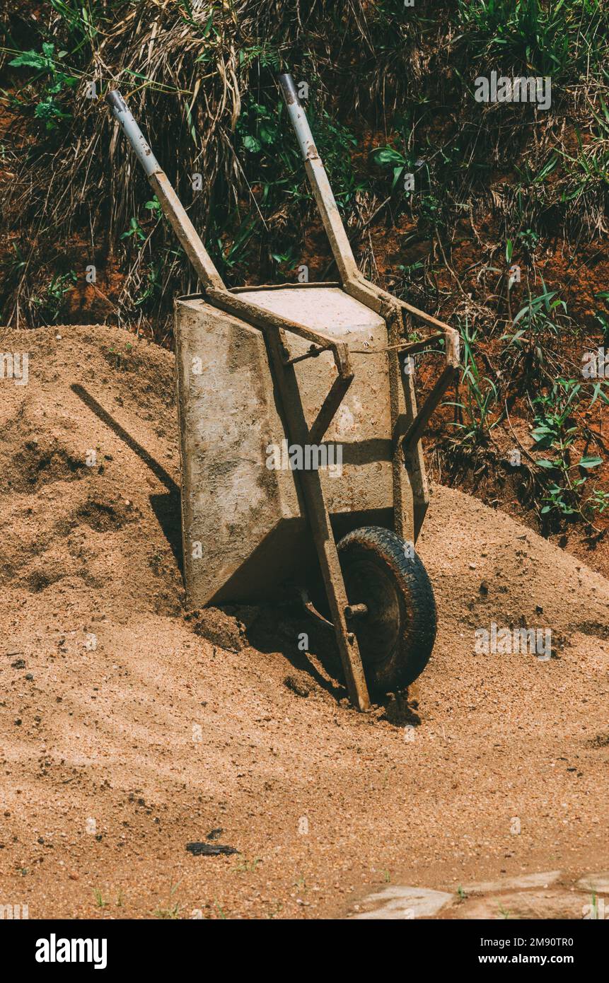construction wheelbarrow with sand Stock Photo - Alamy
