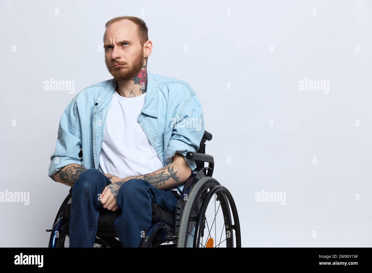 Wheelchair man with tattoos hi-res stock photography and images - Alamy