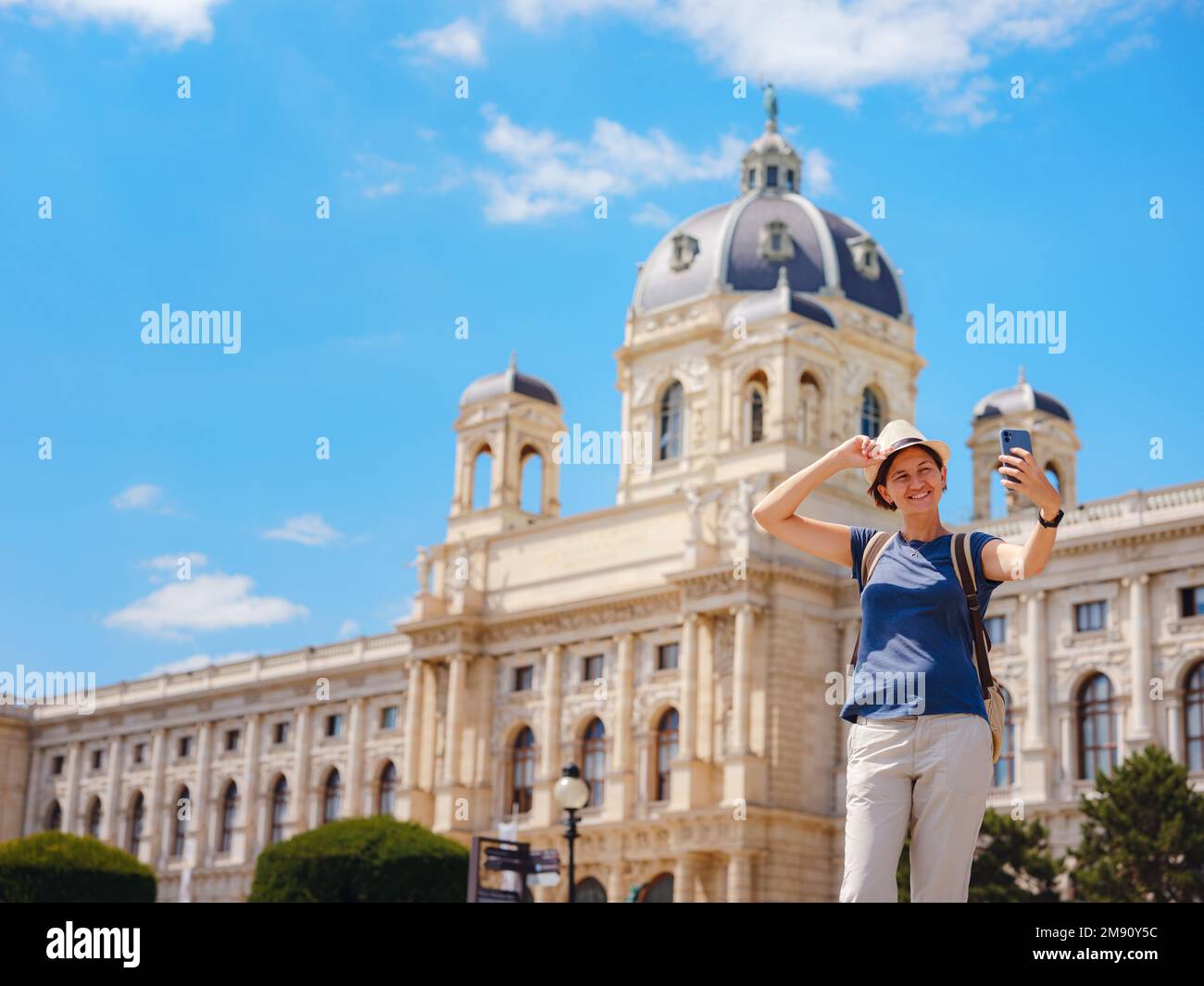 summer female solo trip to Europe, happy young woman walking on ...