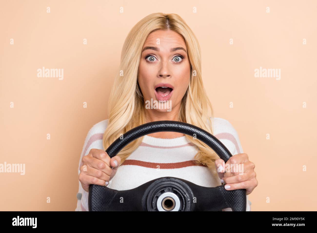 Portrait of positive cheerful girl wavy hair wear striped pullover ...