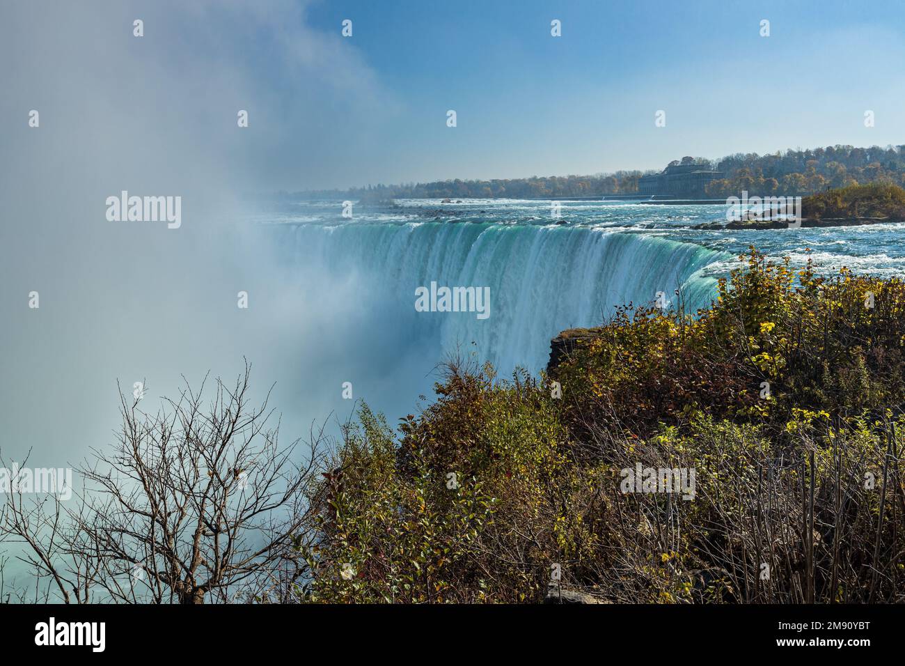 An aerial shot of Niagara Falls and thick steam rising above the ...