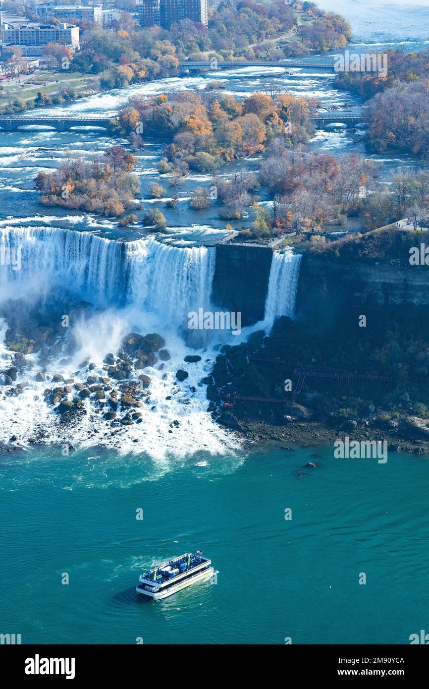 A vertical aerial shot of Niagara Falls and a cruise for tourists ...