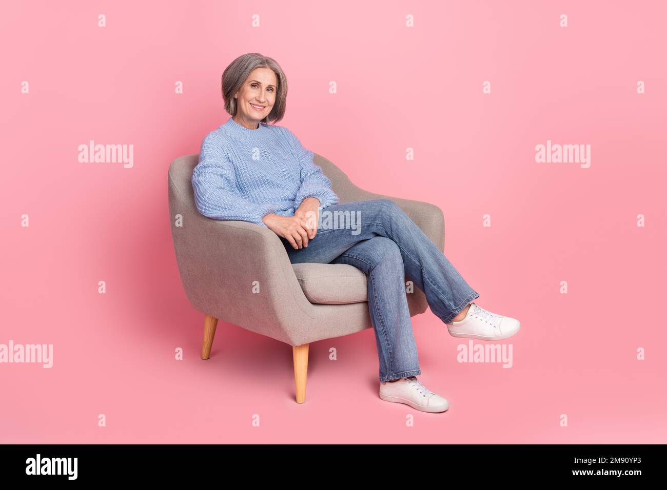 Full length size cadre photo of confident positive successful woman sitting folded legs chill ...