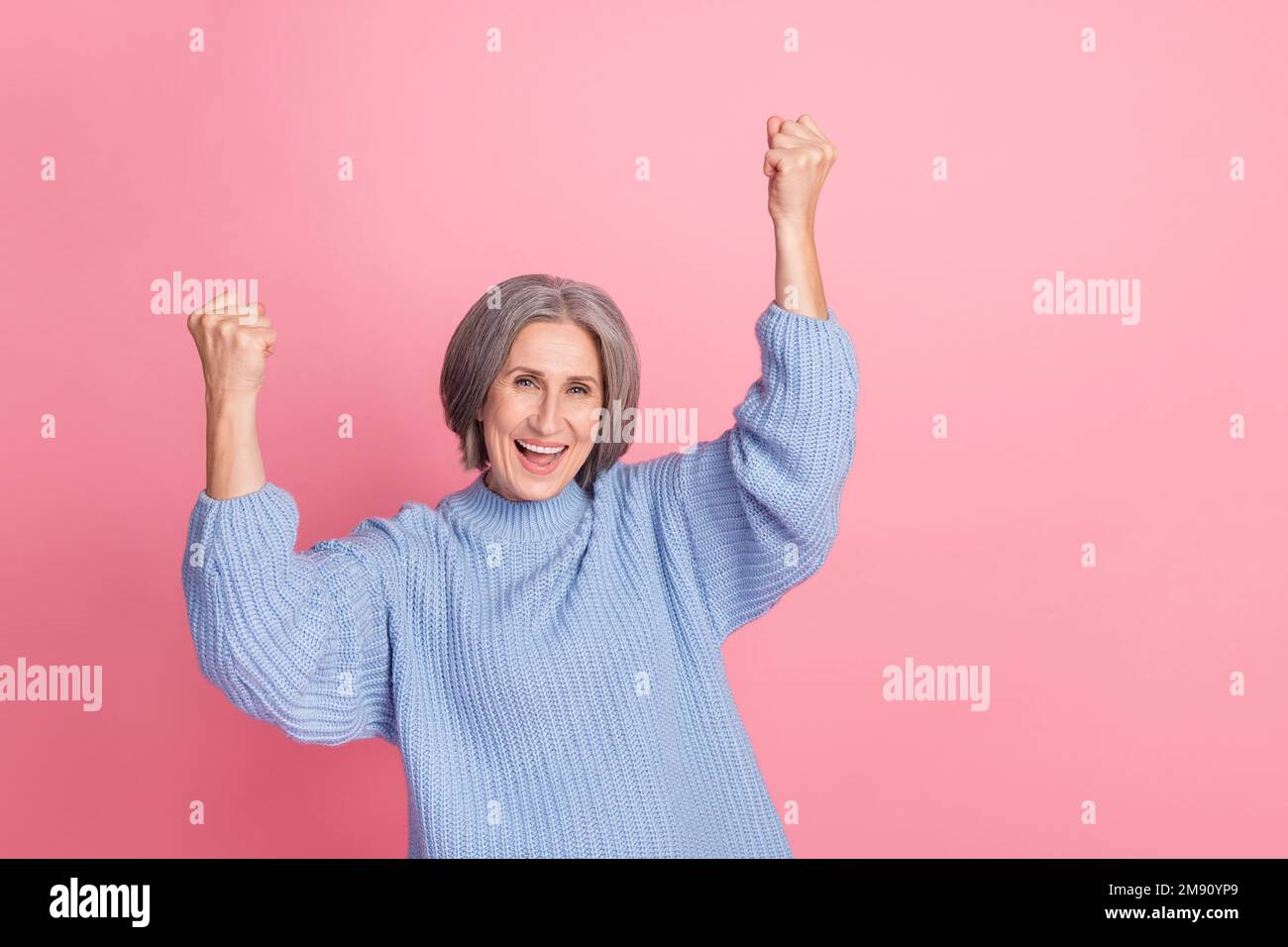 Photo of overjoyed funky business woman pensioner raise fists wearing ...