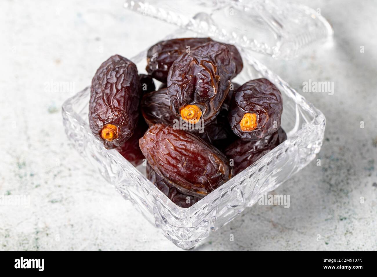 Jerusalem date fruit on stone background. Dried Big date fruit in a ...