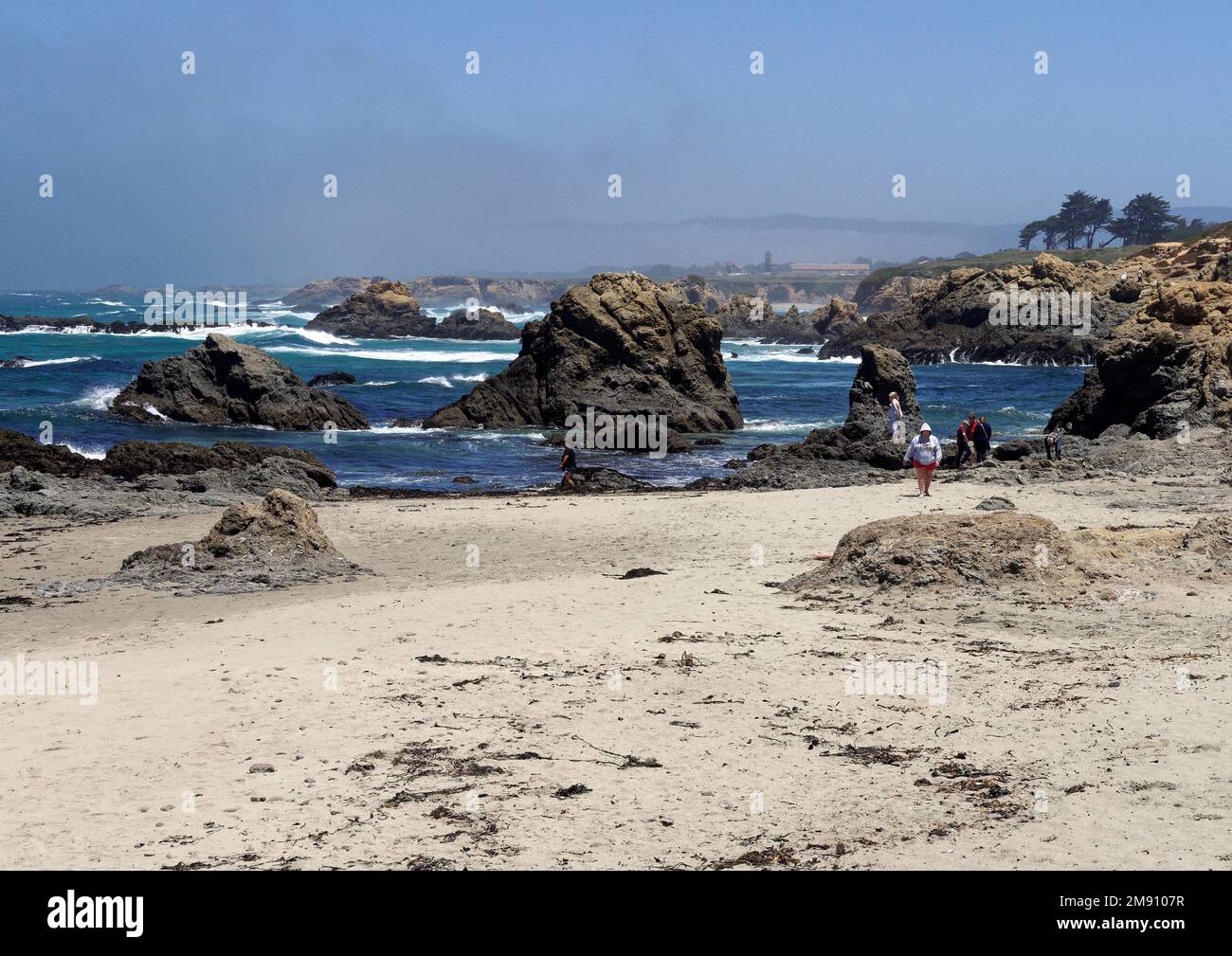 The rocky, rugged and wild beach and coastline at the mouth of the Noyo ...