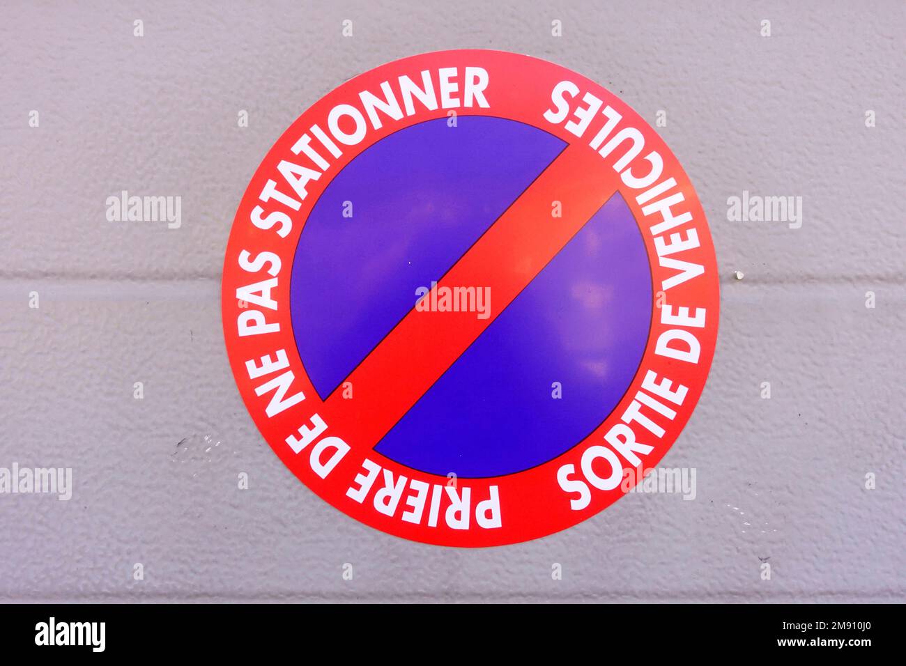 Road sign : Please do not park - vehicle output. Haute-Savoie. Auvergne ...