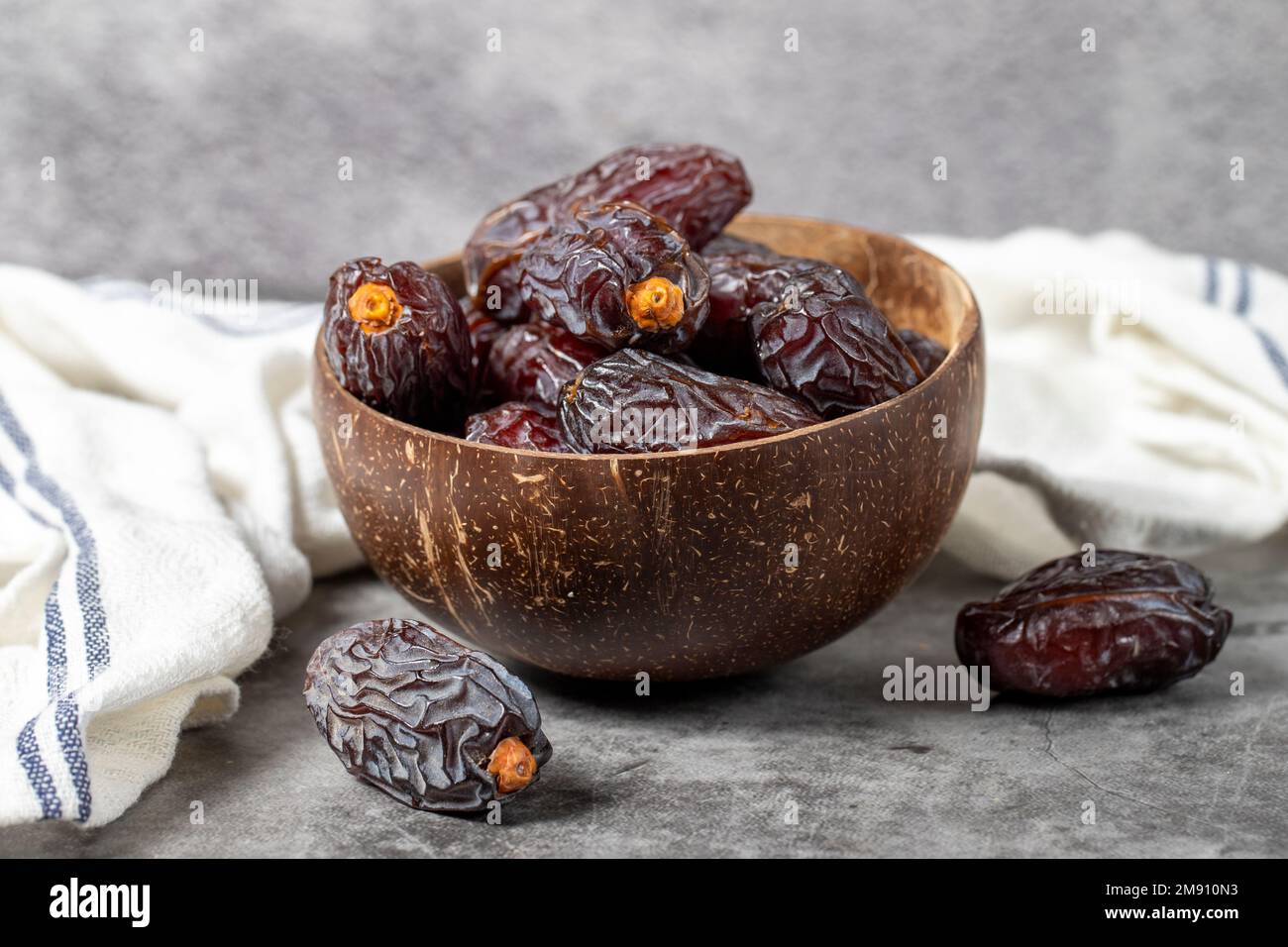 Jerusalem date fruit on stone background. Huge date fruit in a coconut ...