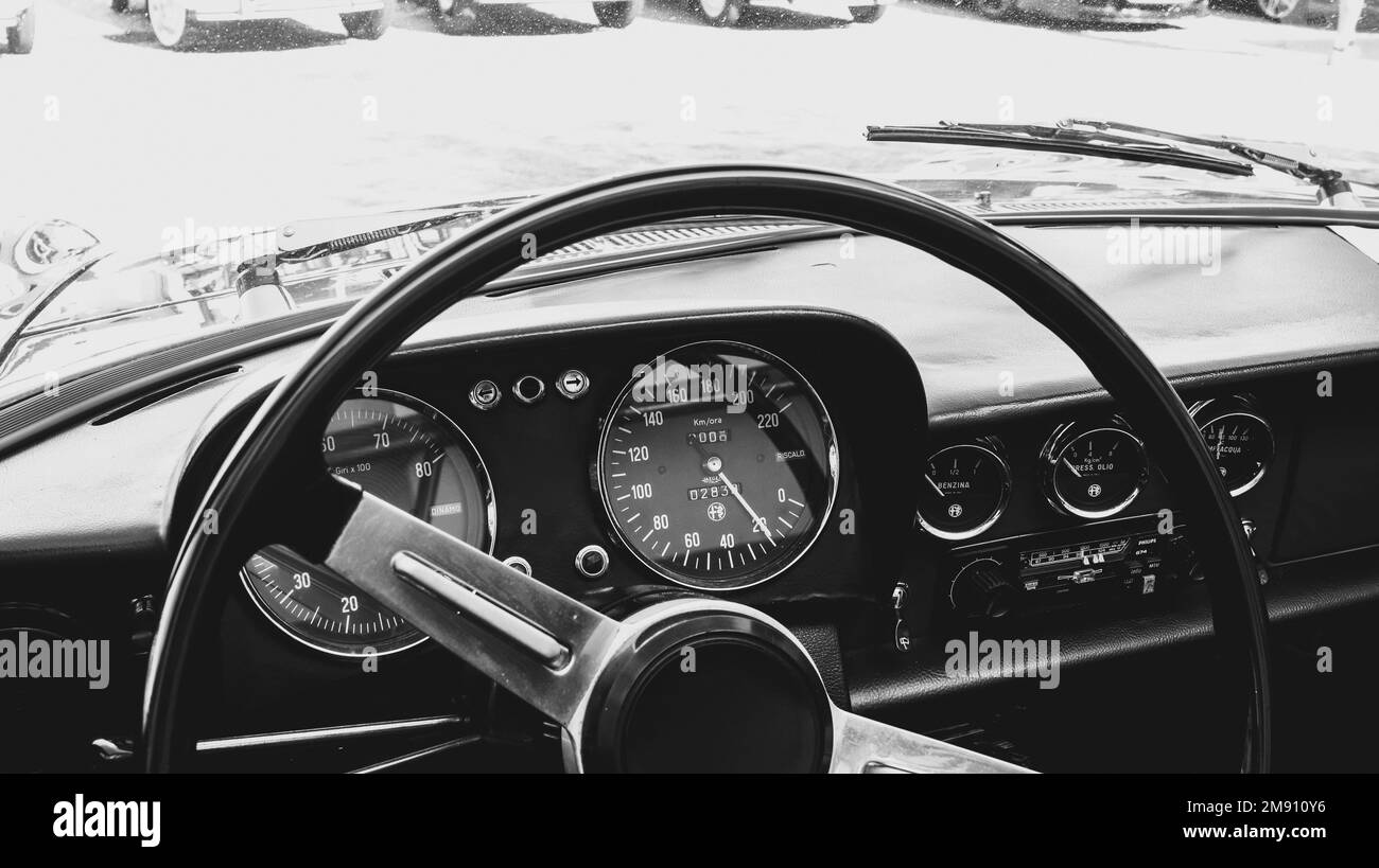 A greyscale shot of a vintage car interior dashboard Stock Photo - Alamy