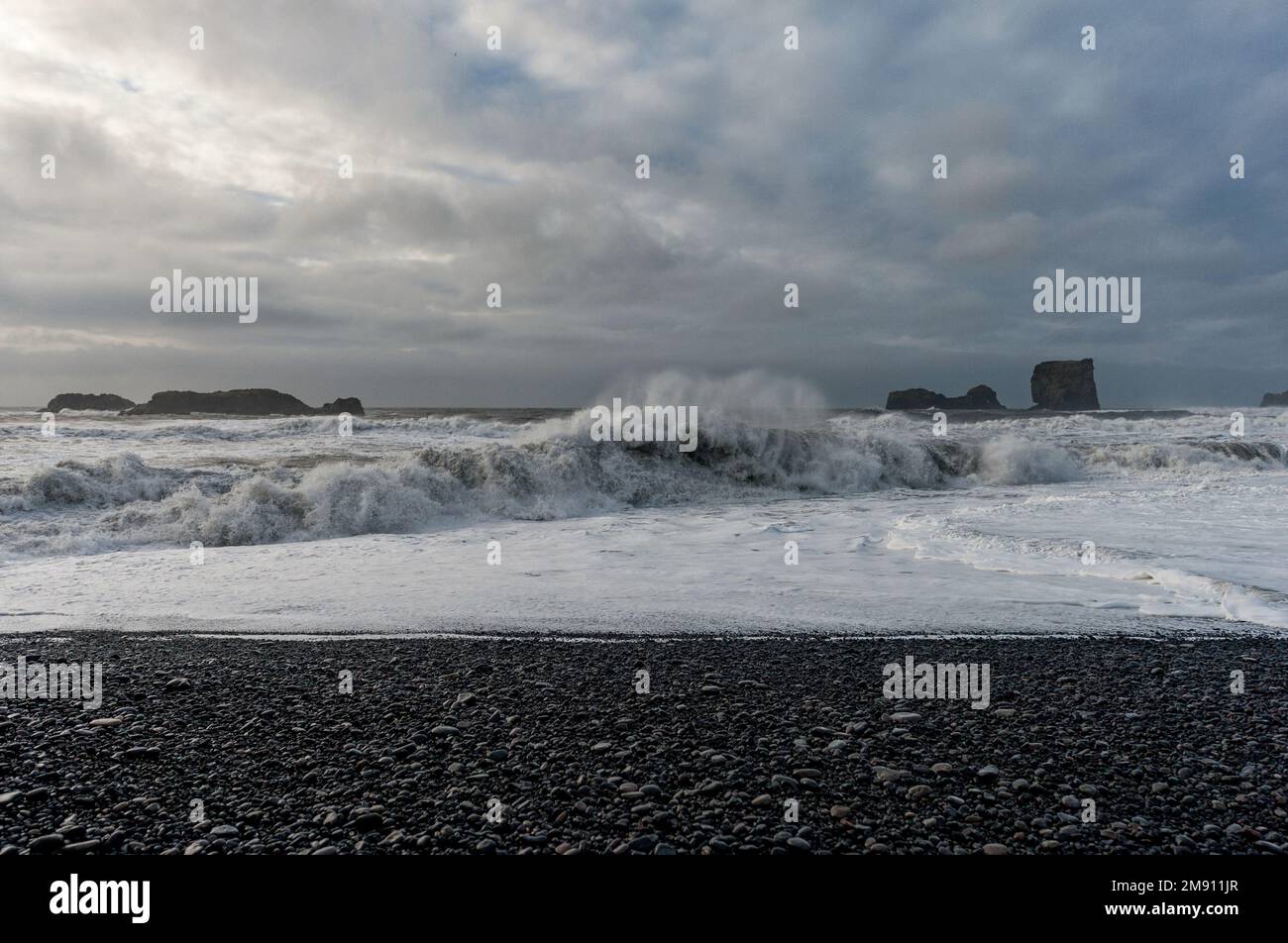Black Sand Beach Reynisfjara in Iceland. Waves and Water Spray Stock ...